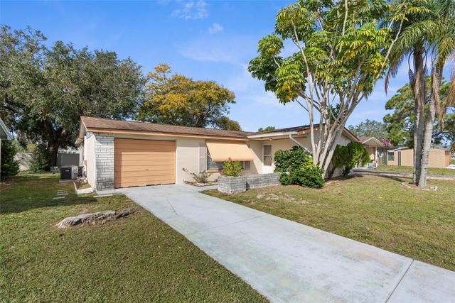 3307 Brookfield Dr, Holiday, FL 34691 | MLS# W7869888 | 27 Photos - Movoto