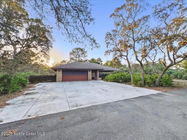 3940 Garvin Lake Dr, Palm Bay, FL 32909 | MLS# 1040845 | 33 Photos - Movoto