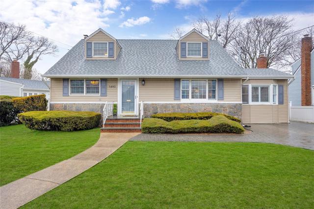 1493 N Meadow Rd, Merrick, NY 11566 | MLS# 845021 | 27 Photos - Movoto