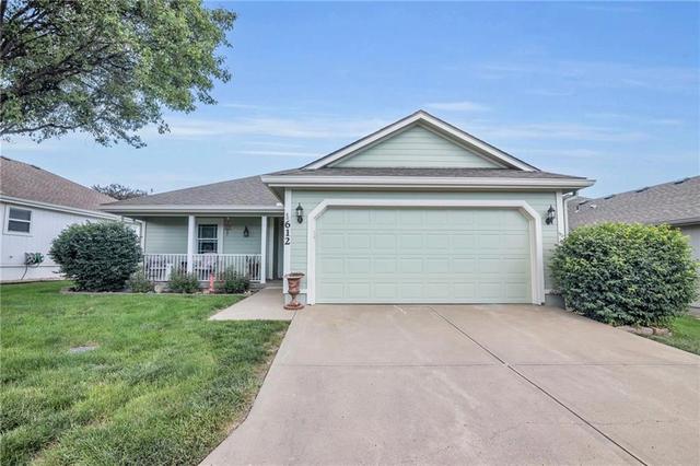 612 Sun Dr, Raymore, MO 64083 | MLS# 2551082 | 29 Photos - Movoto
